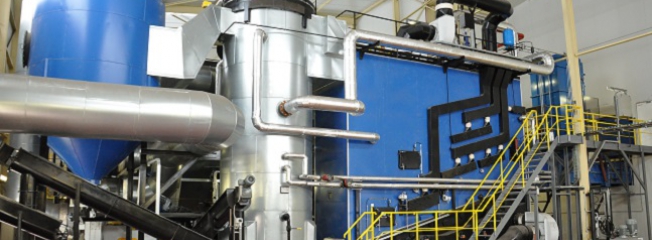 O centrală care arde paie pentru a furniza agent termic în mai multe ...