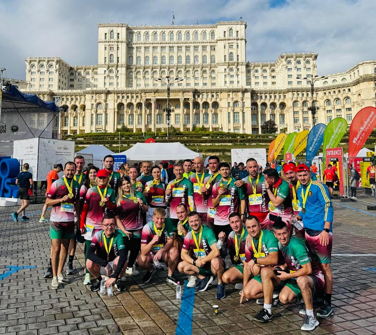 Maratonul faptelor bune: echipa Cris-Tim a alergat pentru o cauză nobilă la Bucharest Marathon ...